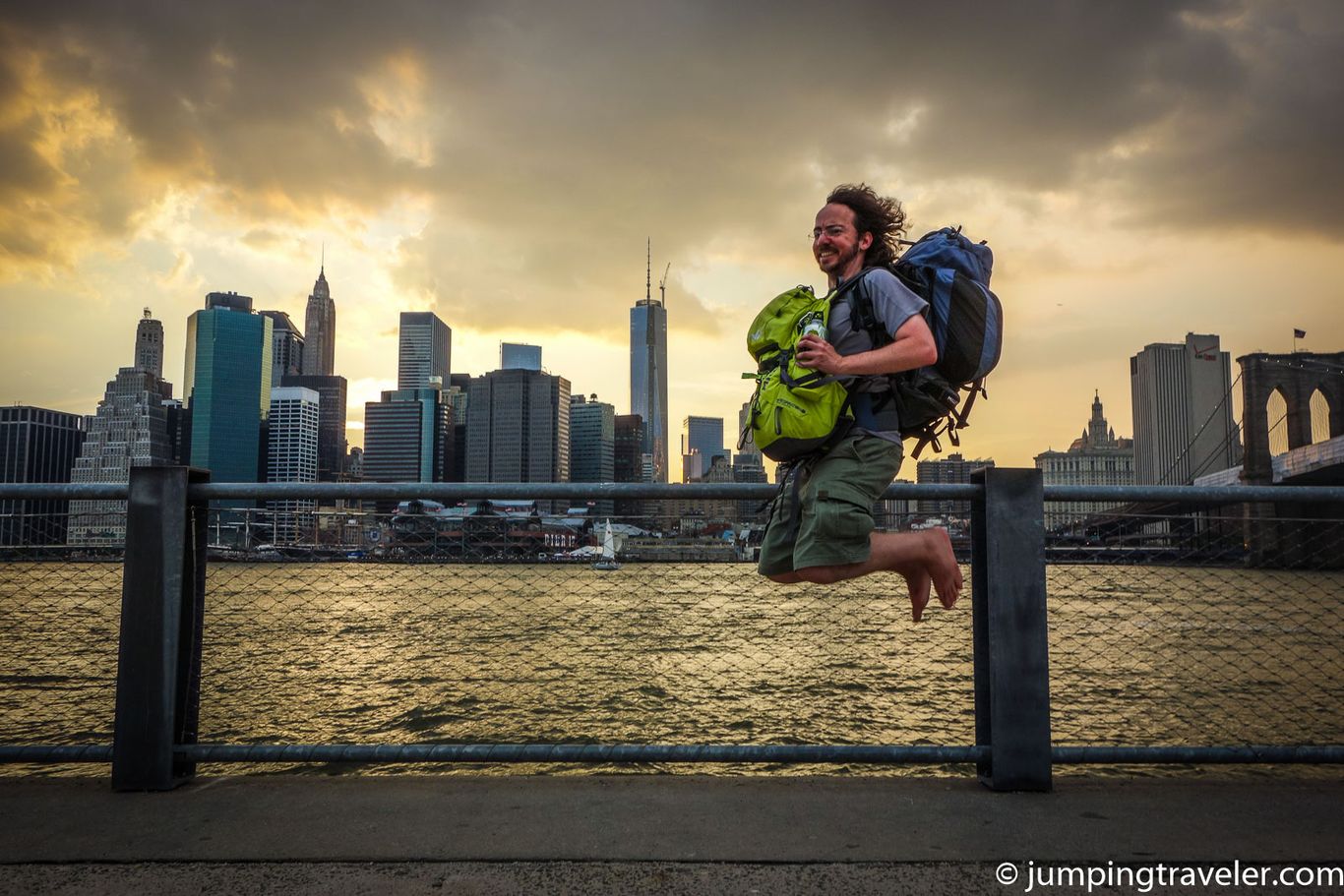 Jumping in front of Manhattan | Jumping Traveler
